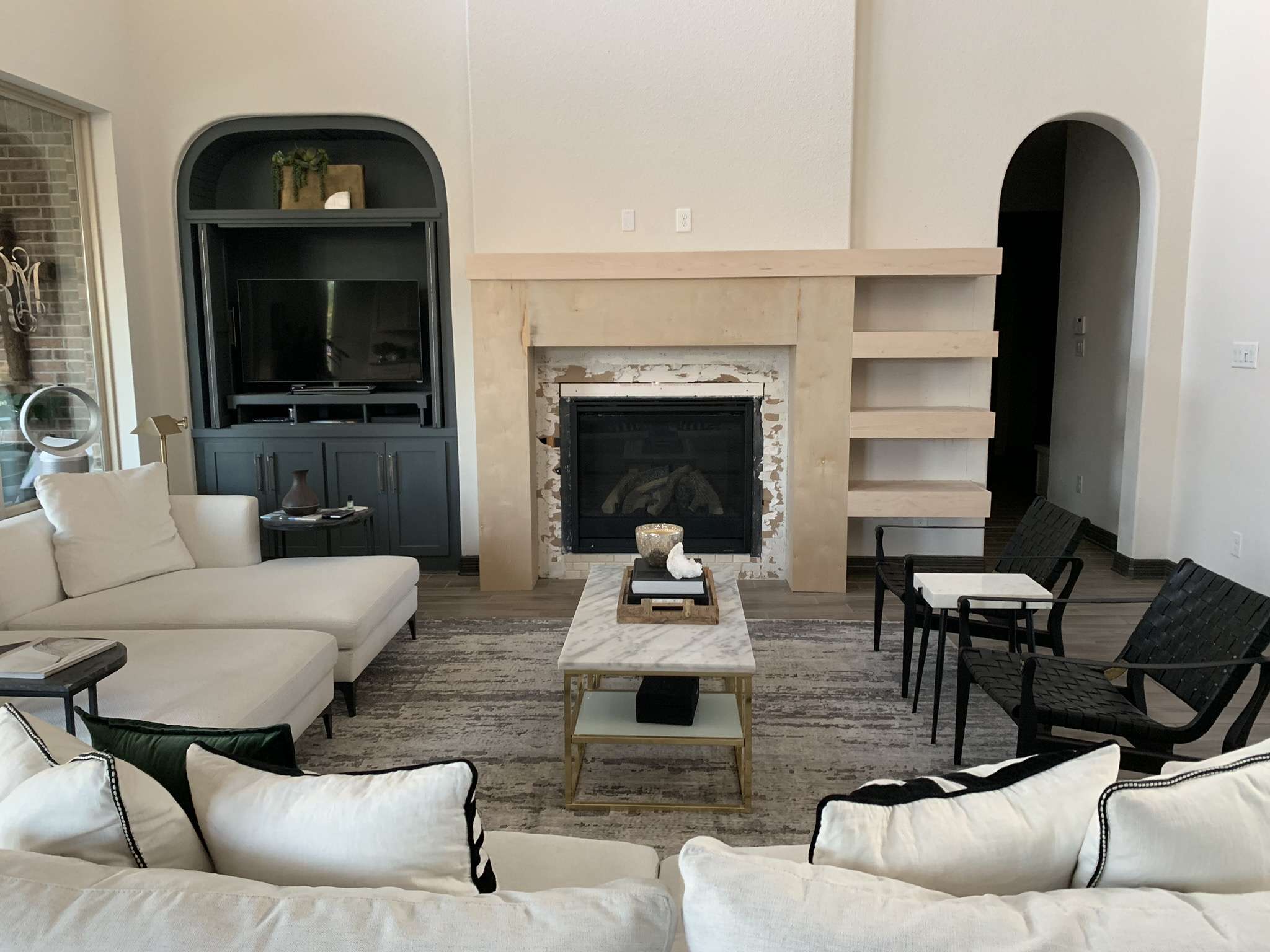 Modern Fireplace with Floating Shelves – Melissa Roberts Interiors